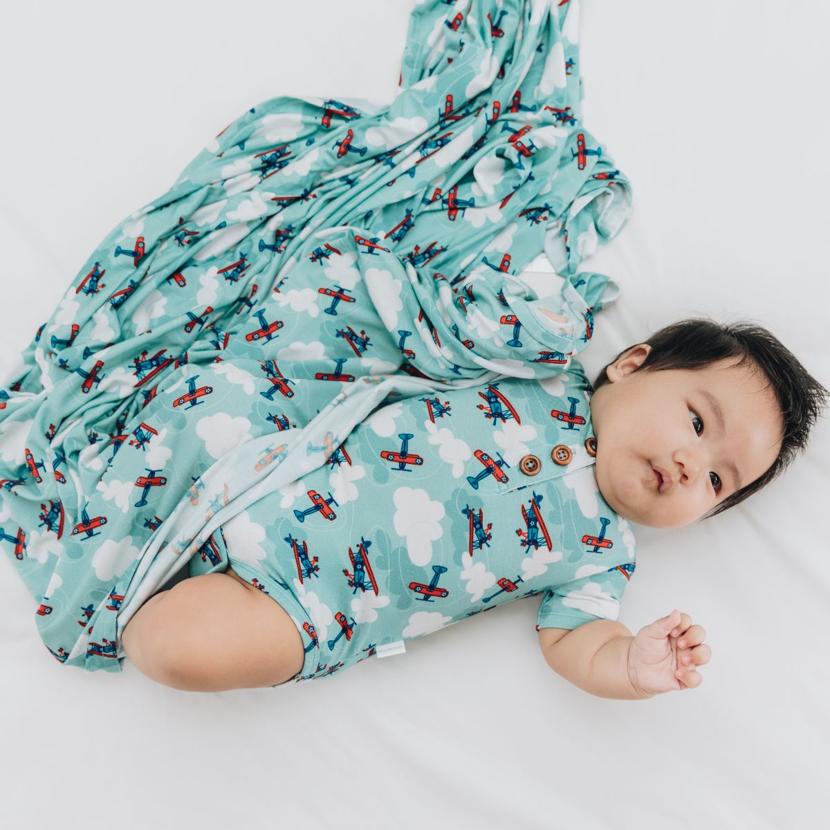 Jet Set Go Newborn Onesie – The Plush Club